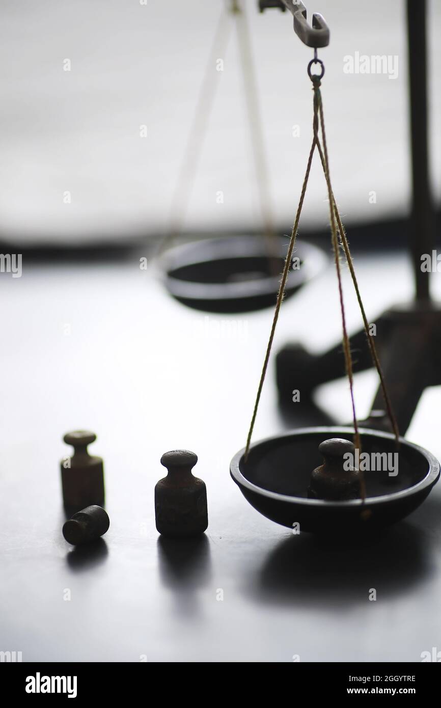 Tiny weights vintage balance scales. Detail of Ancient old scale ...