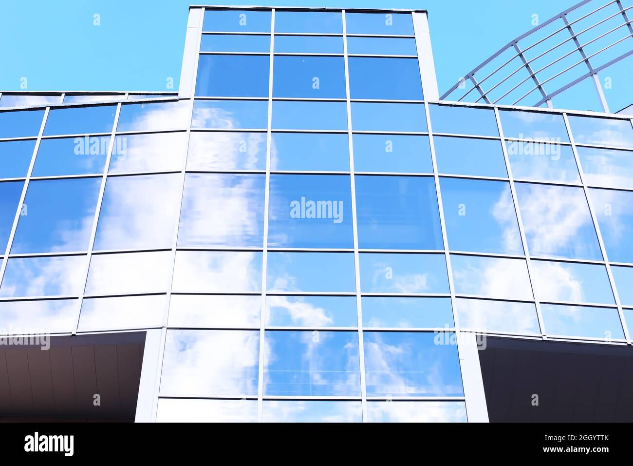 Architectural detail of the facade with multiple reflections of other ...