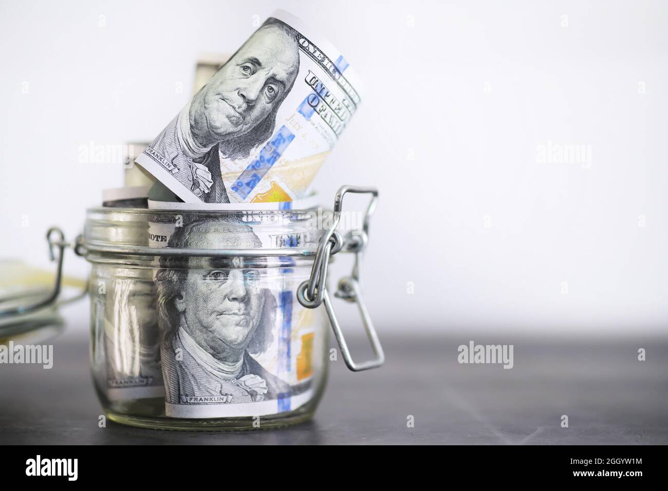 Cash money in a large pile as a finance background. Paper money close ...