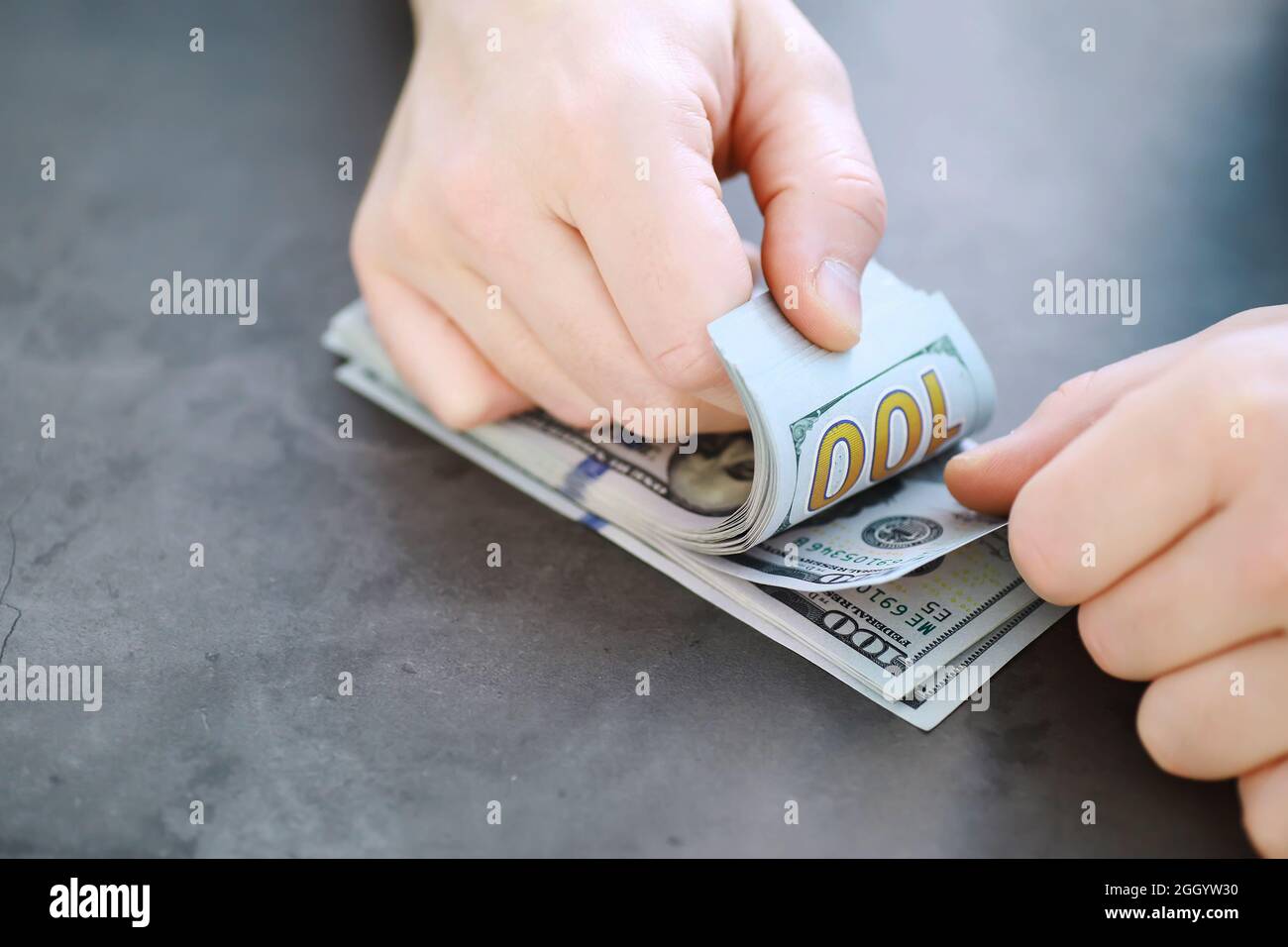 Cash money in a large pile as a finance background. Paper money close ...