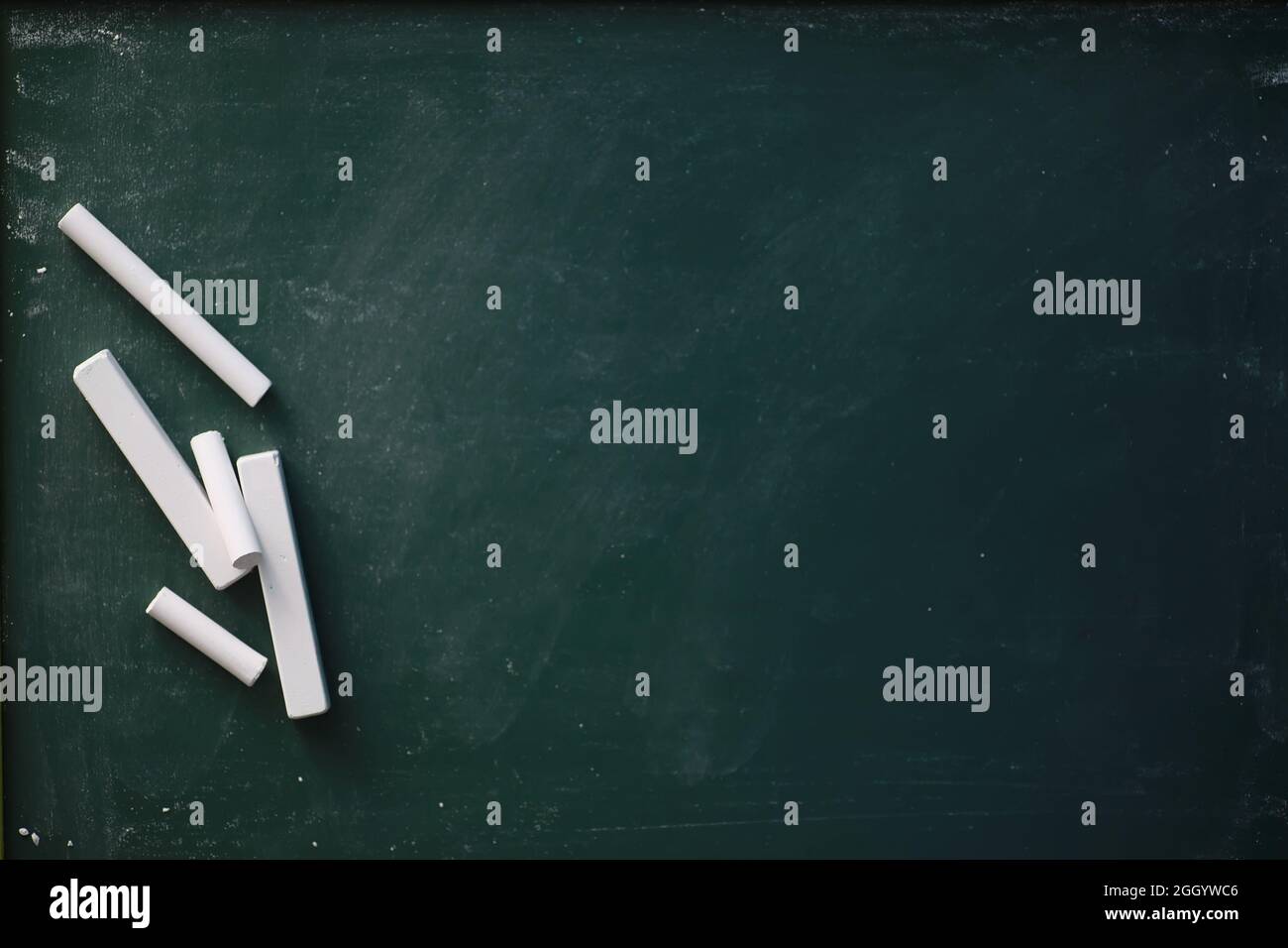 Chalkboard. Crayons for writing on blackboard. Learning concept. School ...