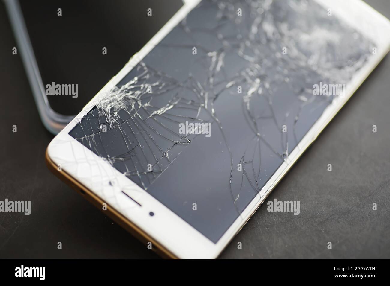 Crack on the glass. Broken screen. Broken phone. Cracked glass ...