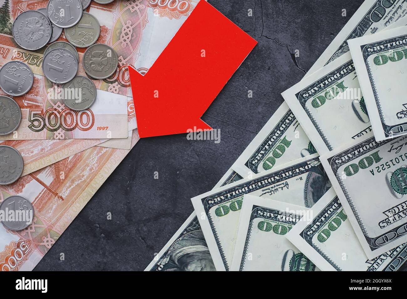 Russian money with the inscription "ruble". Economic crisis. The fall ...