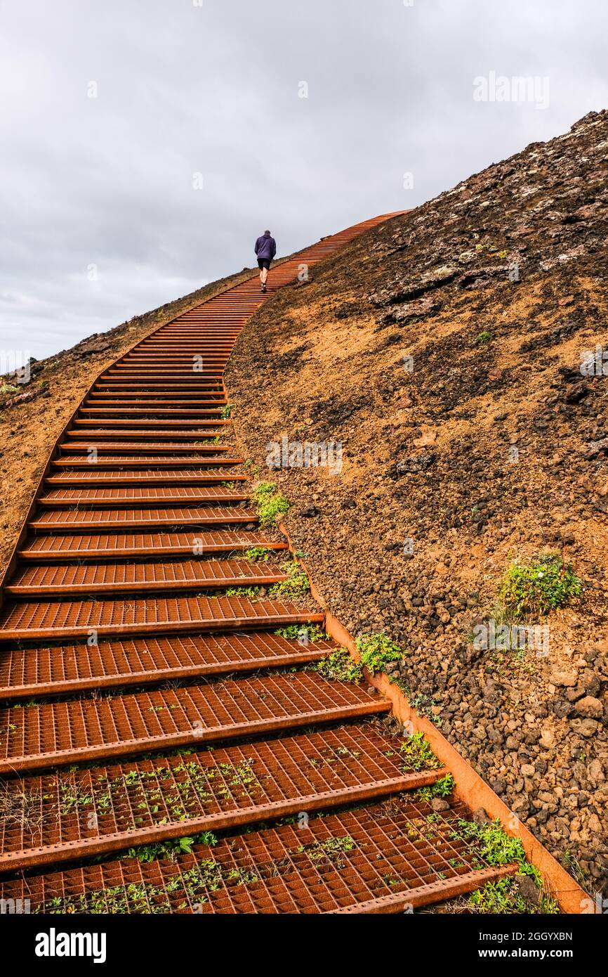Man Climbing Up Stairs On A Hill High Resolution Stock Photography and ...