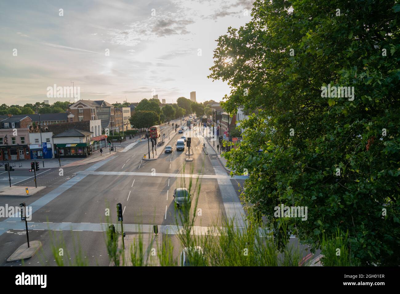 London UK, Mile End Road scene with transport and normal late afternoon ...