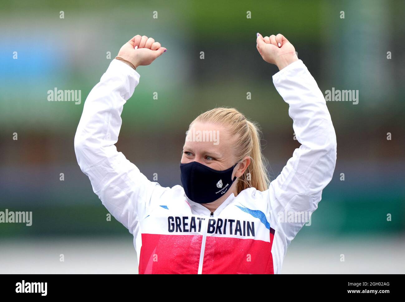 Great Britain's Laura Sugar celebrates on the podium before receiving ...