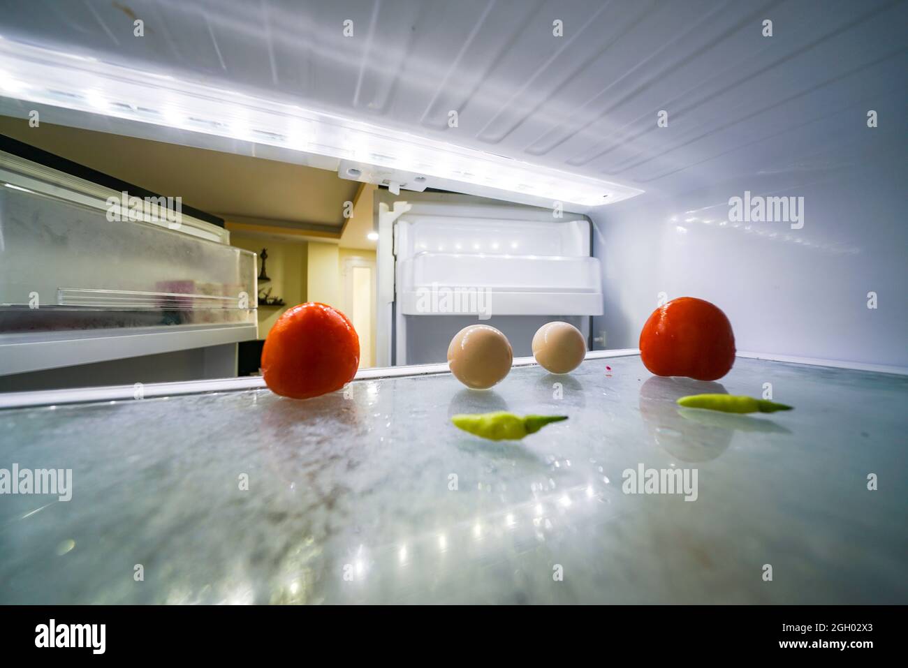 Food inside refrigerator in the kitchen Stock Photo - Alamy