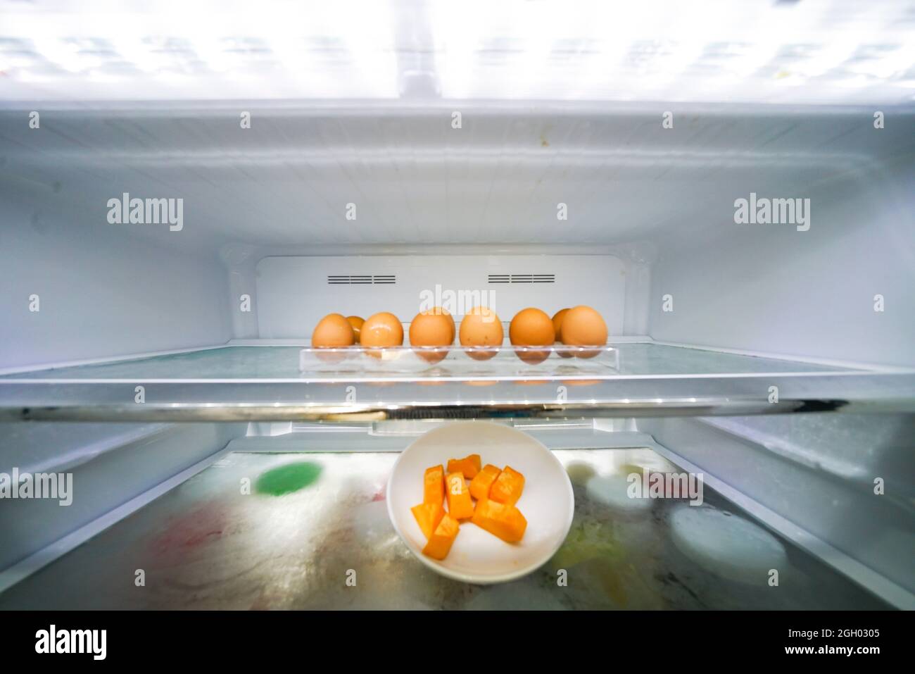Food inside refrigerator in the kitchen Stock Photo - Alamy