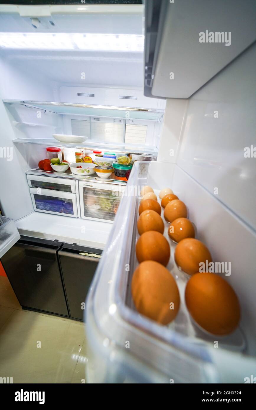 Food inside refrigerator in the kitchen Stock Photo - Alamy