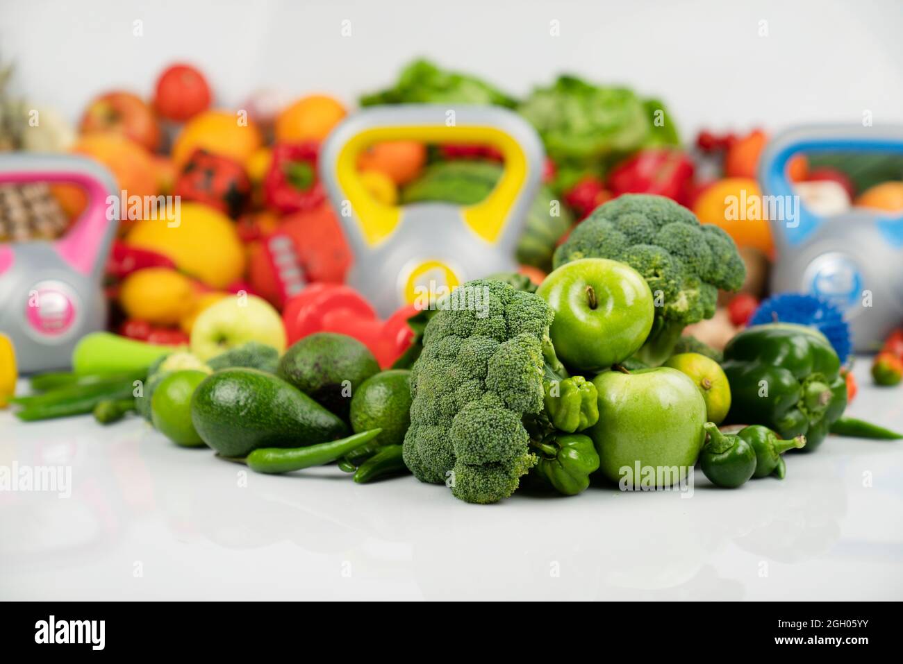 Fitness concept. Healthy nutrition: fruits and vegetables. Equipment ...