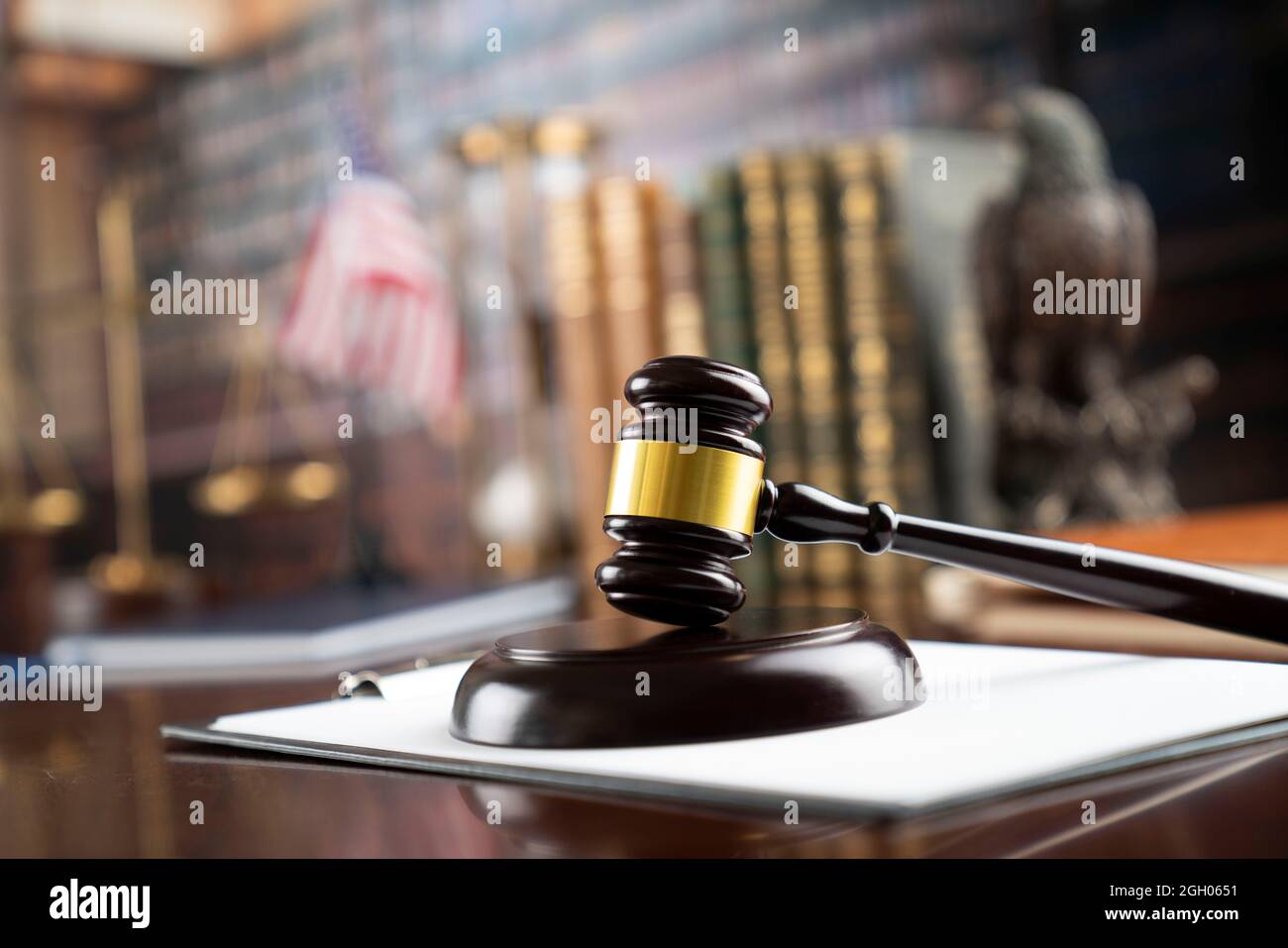 Judge office. Gavel on brown shining table and collection of legal ...