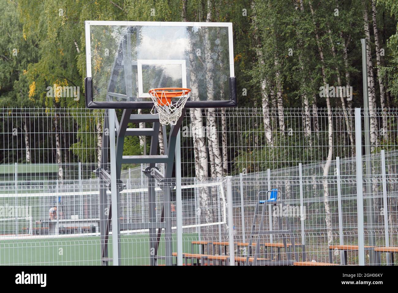Basketball hoop on an outdoor sports ground in the park. High quality ...