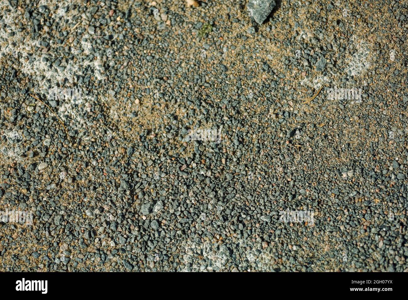 Background, small stones of gray color on a ground. High quality photo ...