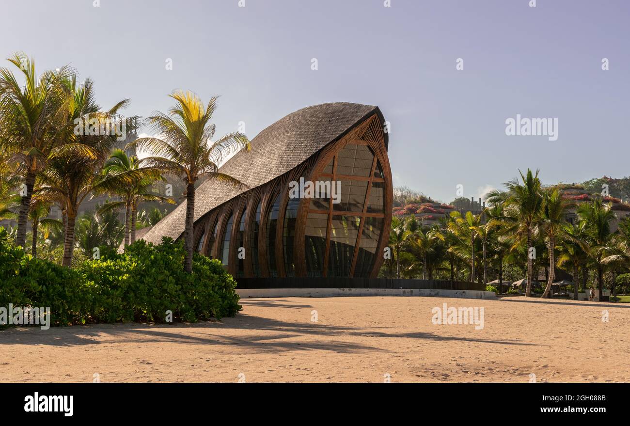 glass modern building on the tropical beach in Bali Stock Photo - Alamy