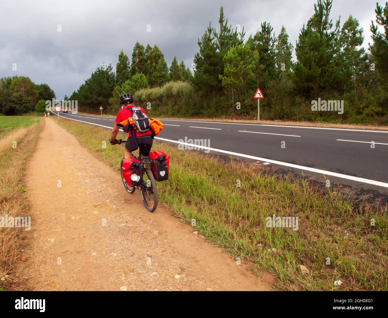 Pilgrim doing the Camino de Santiago by bicycle Stock Photo - Alamy