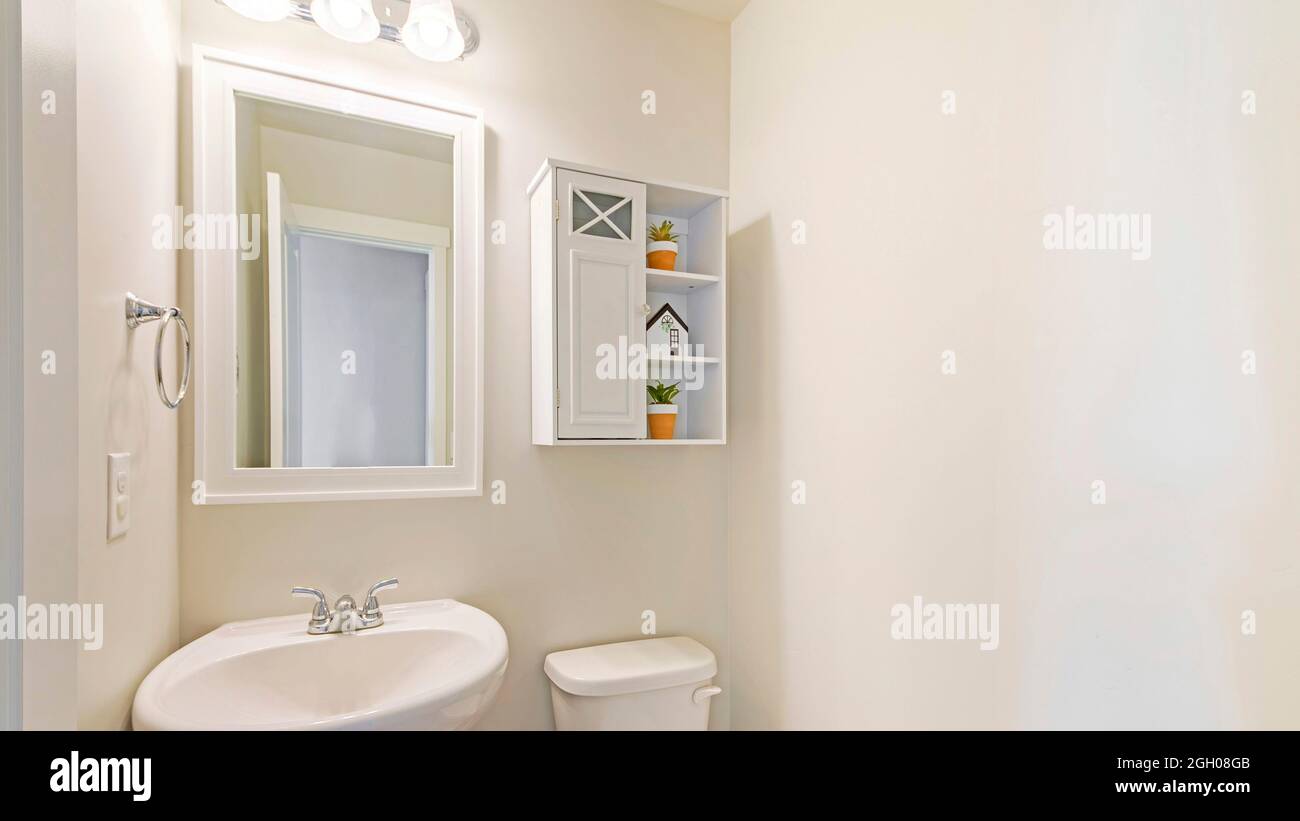 Pano Interior of a white powder room with minimalist design Stock Photo ...