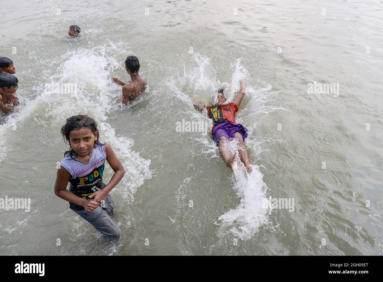 River children bathe hi-res stock photography and images - Alamy