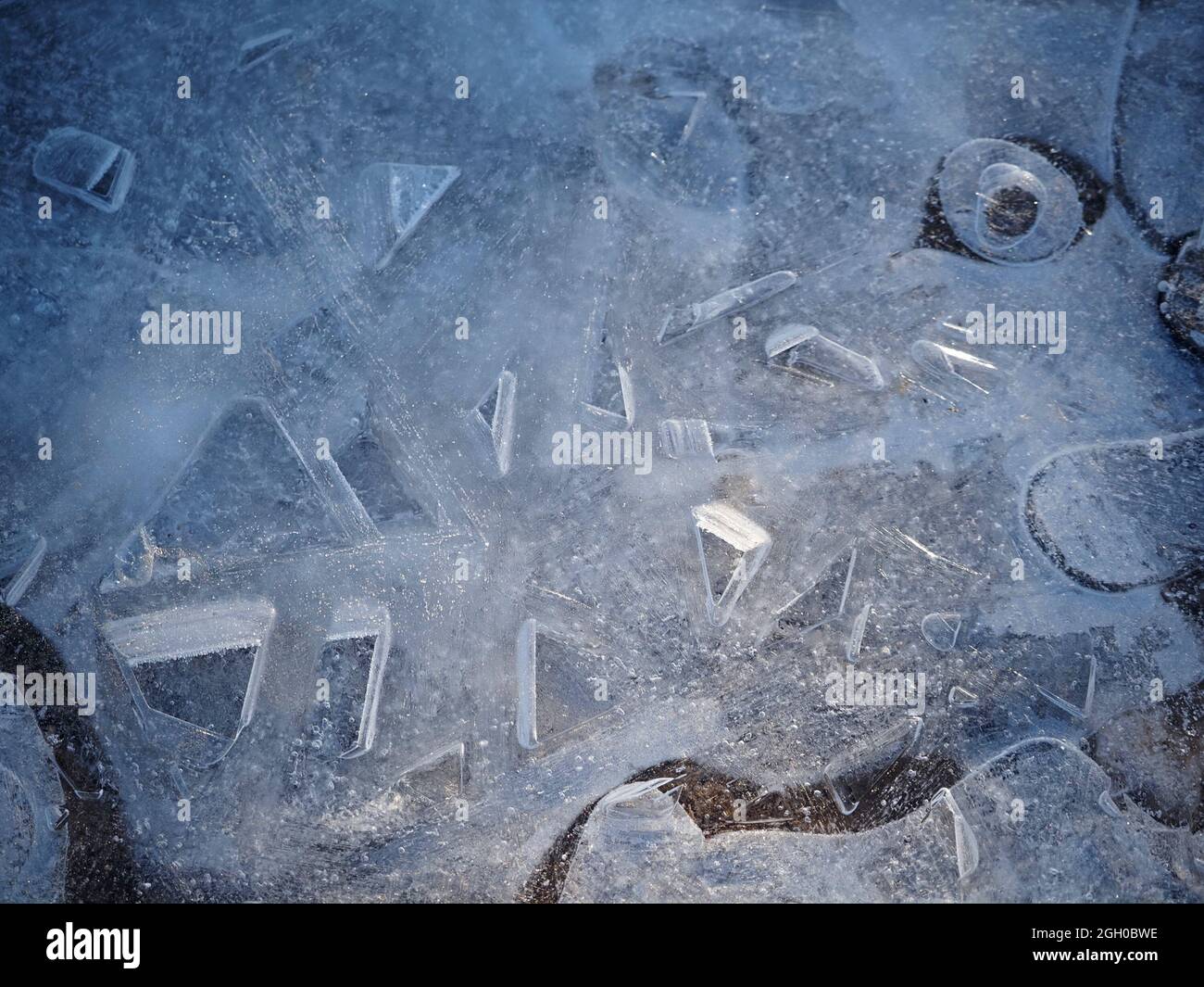 Shapes in frozen puddle hi-res stock photography and images - Alamy