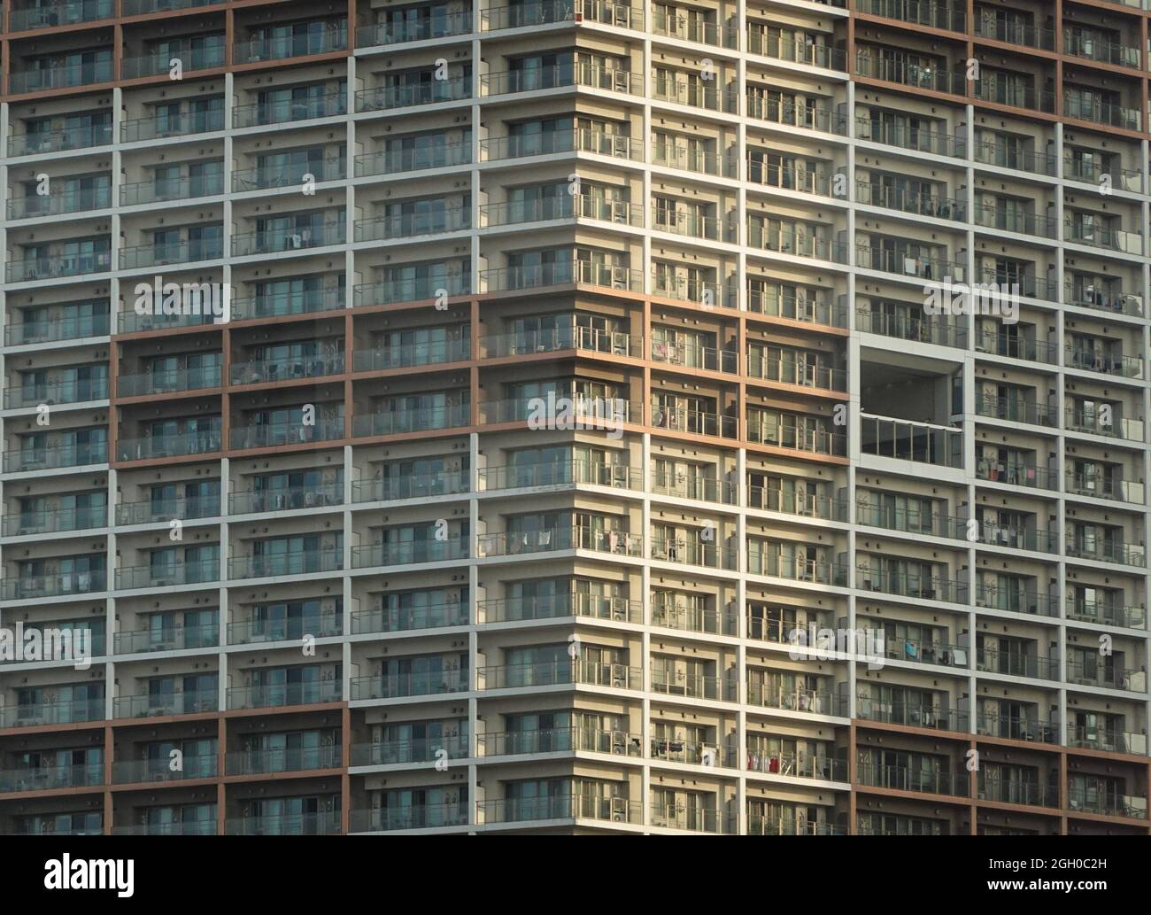 Tokio, Japan. 26th Aug, 2021. A high-rise apartment building can be ...