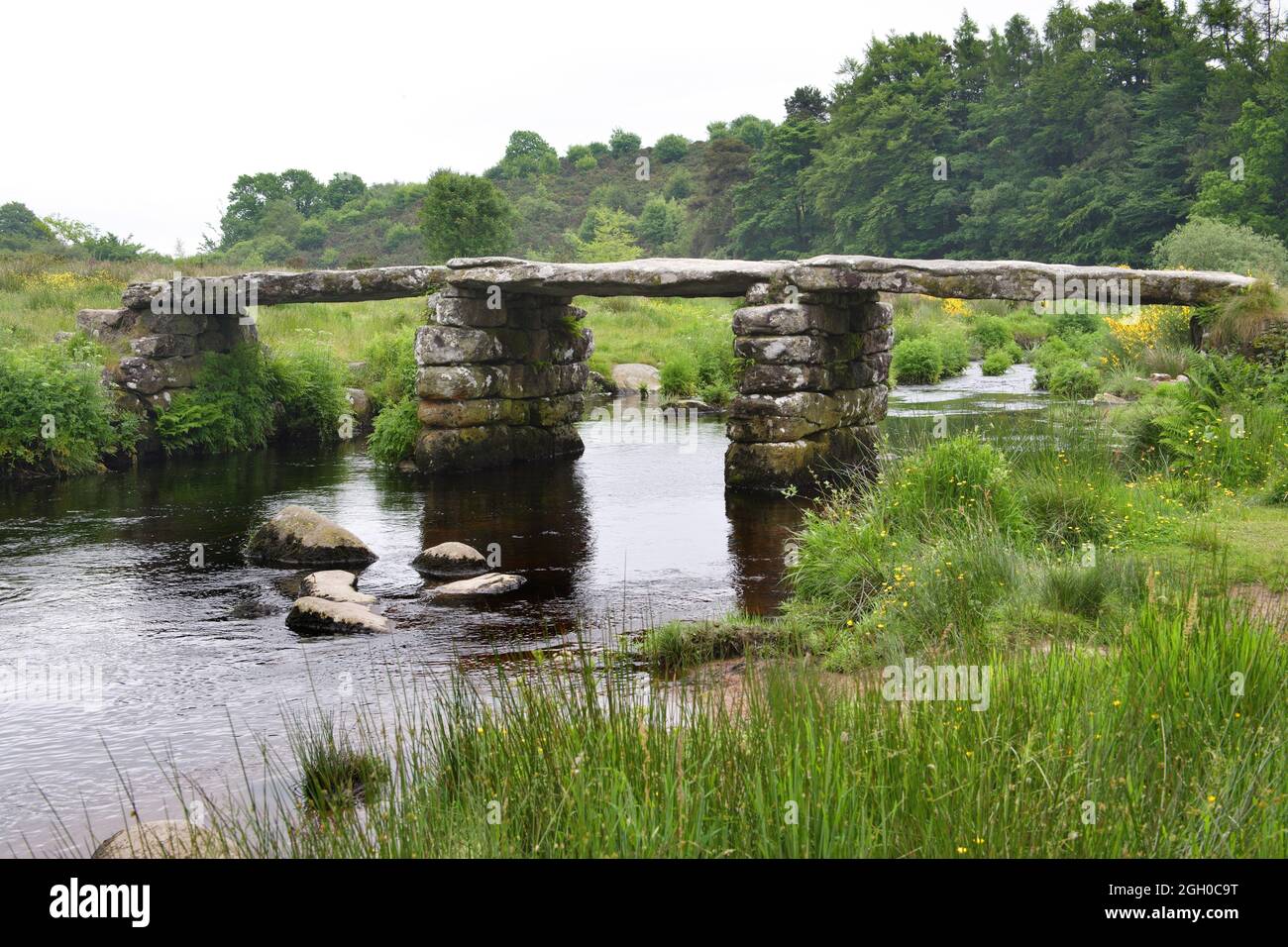 ancient clapper bridge at two bridges over the west dart river on ...