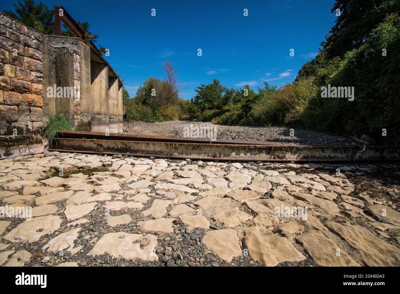 The riverbed without water, the drought takes its toll. The riverbedbed ...