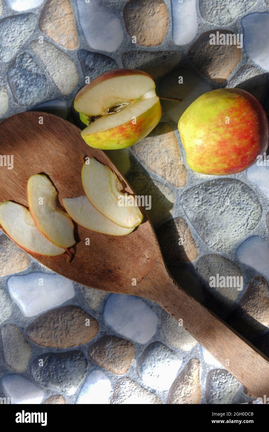 Top view of apples in various styles, some are still intact, some are ...