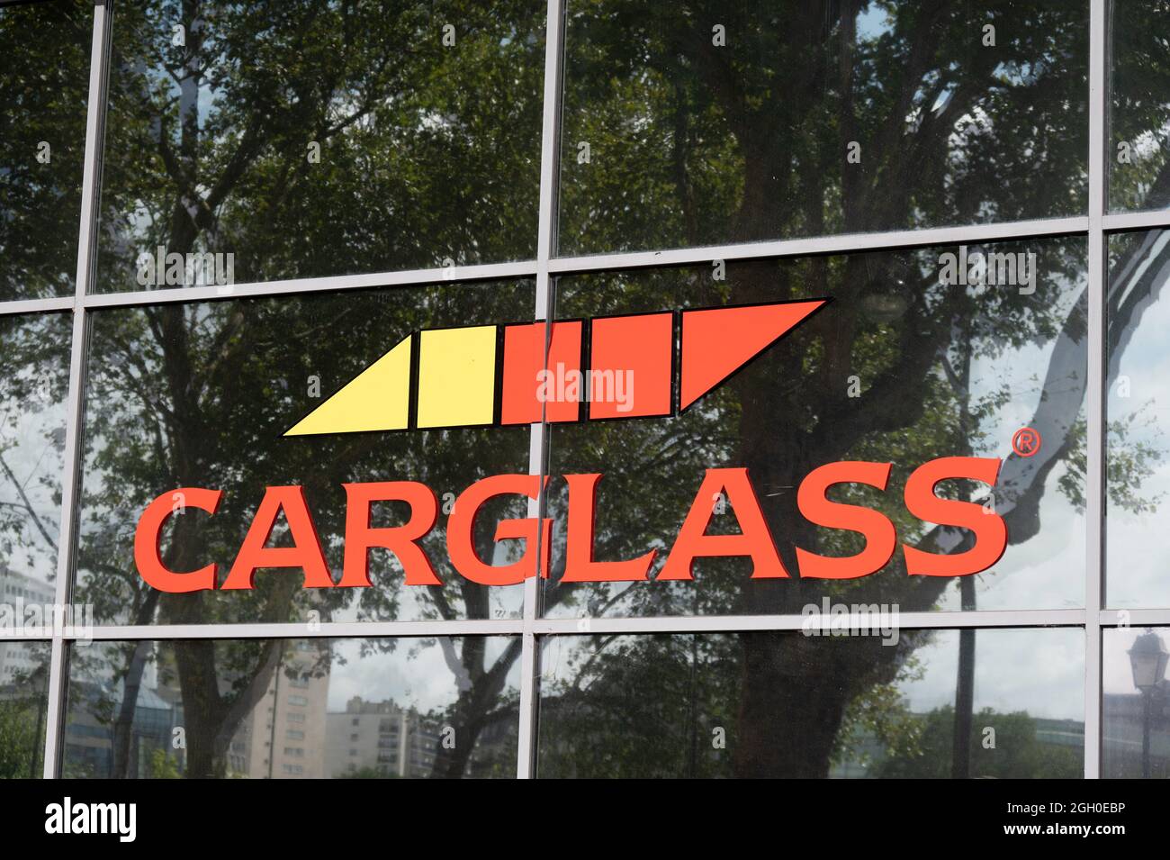 A shop sign of CARGLASS, on September 03, 2021 in Angouleme, France ...