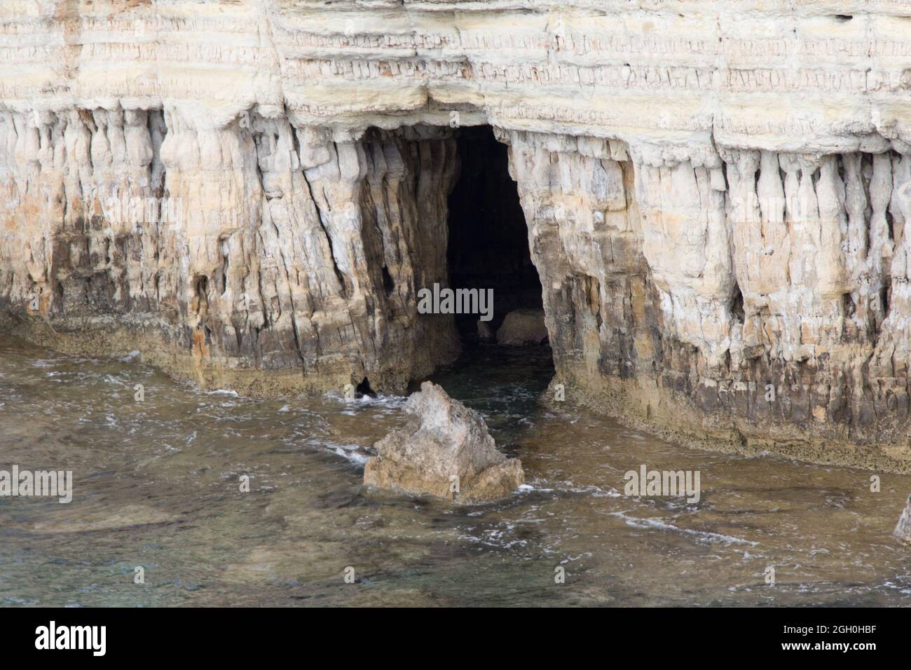 The view of a cave at rocky coastline around Cape Greco, Cyprus Stock ...