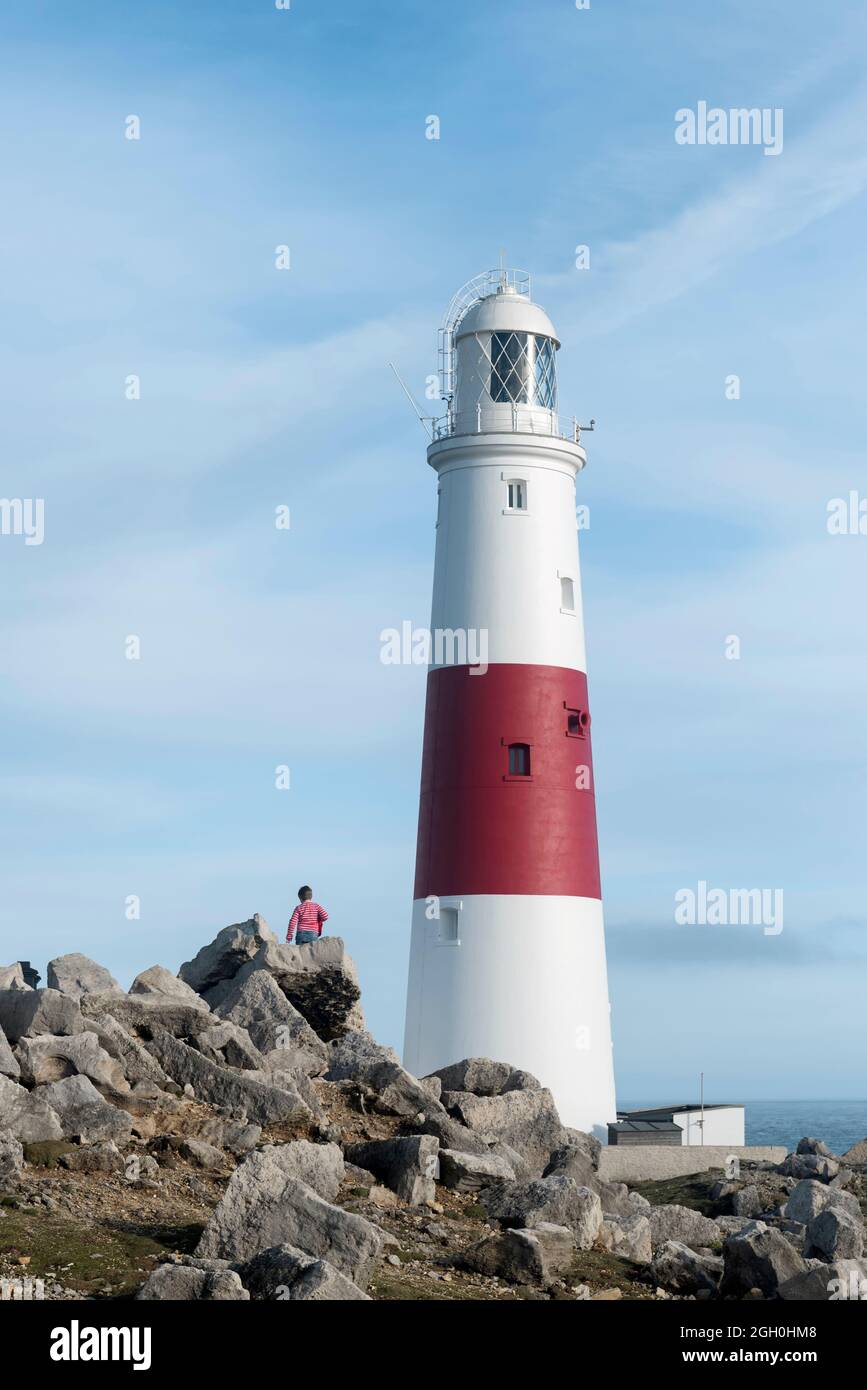 Child walking around lighthouse Stock Photo - Alamy
