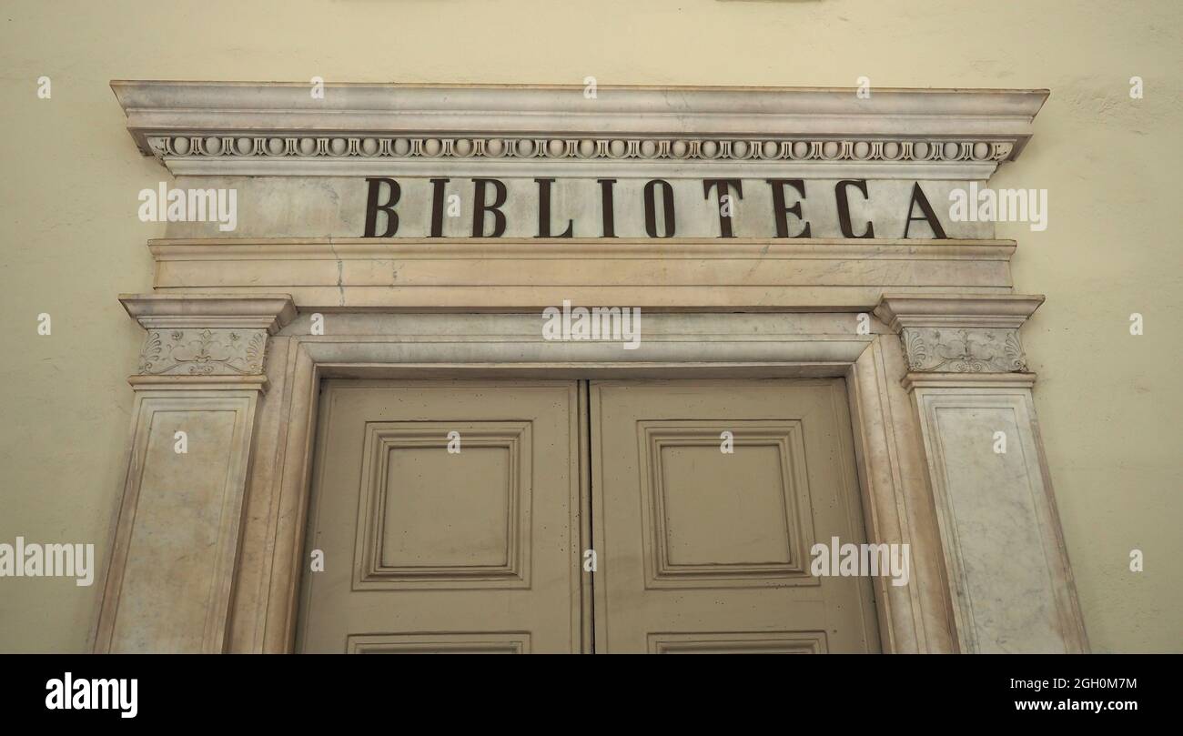 Italian biblioteca sign (translation: library) over ancient door Stock ...