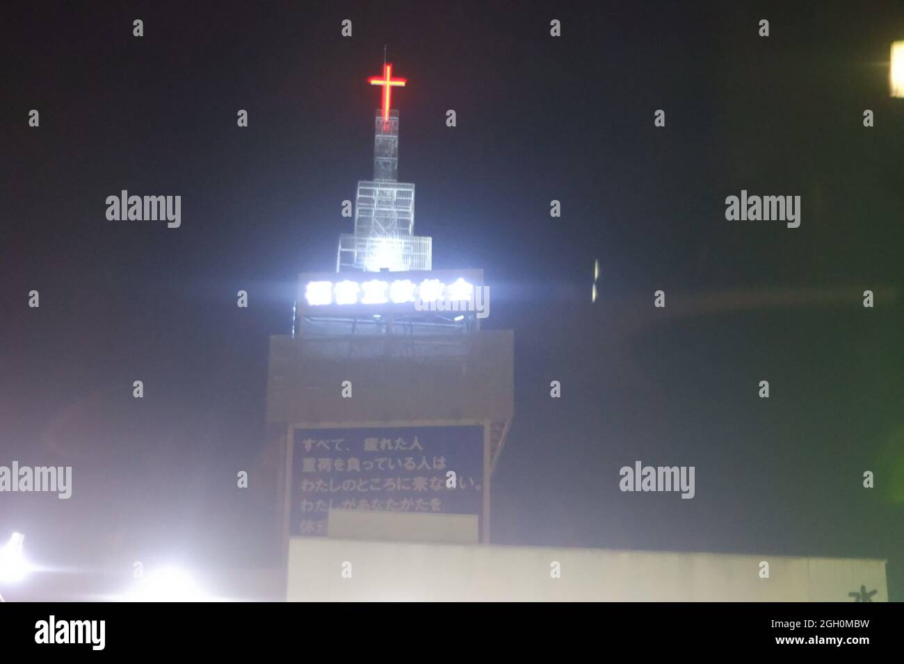 Neon red cross on the church roof - night black sky background Stock ...