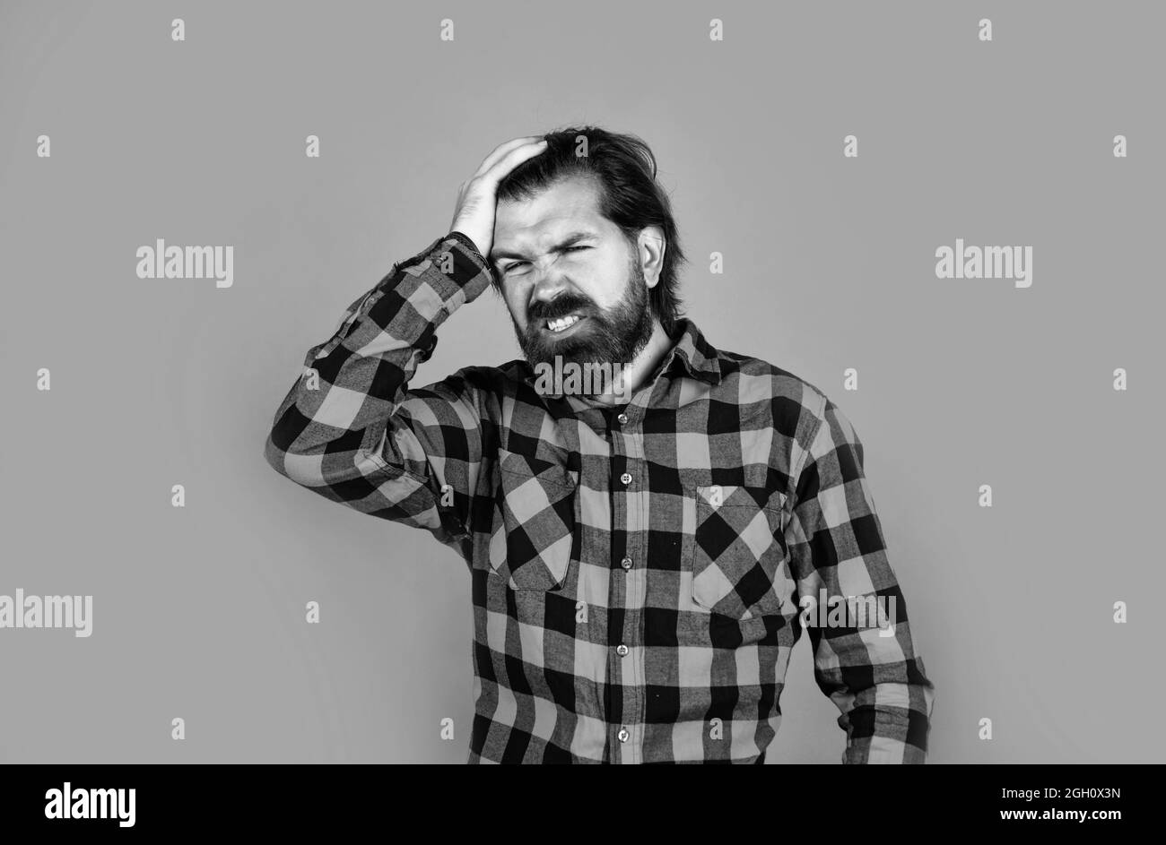feeling bad. bearded man in checkered shirt. casual guy express human ...