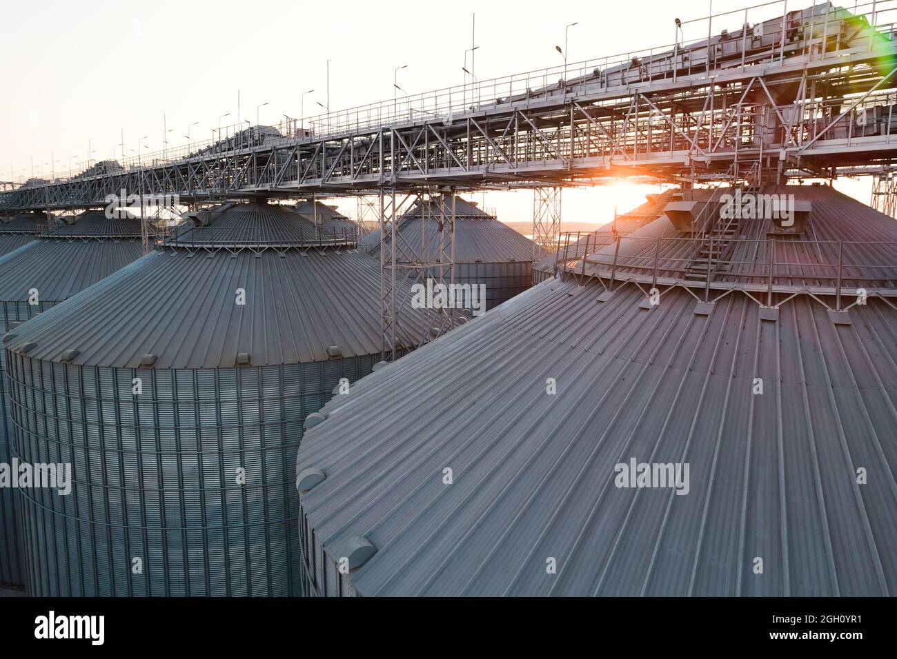 Grain terminals of modern sea commercial port. Silos for storing grain ...