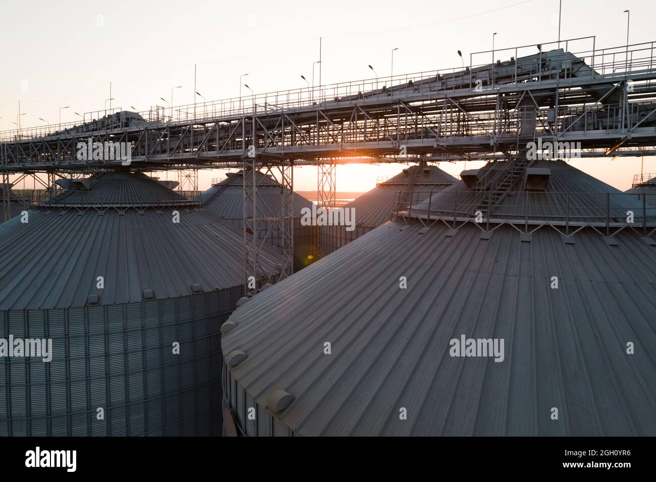 Grain terminals of modern sea commercial port. Silos for storing grain ...