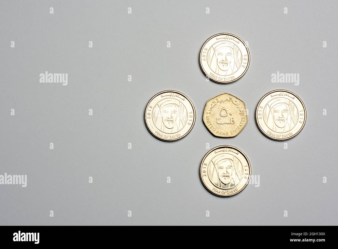 UAE 1 Dirham Coins and fifty Fils isolated on white background, 50th ...