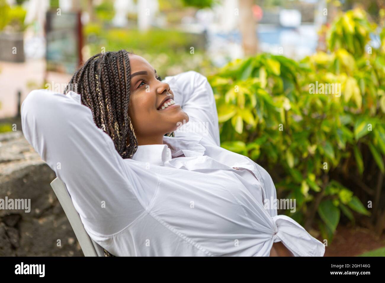 Leaning back relaxing stretching hi-res stock photography and images ...