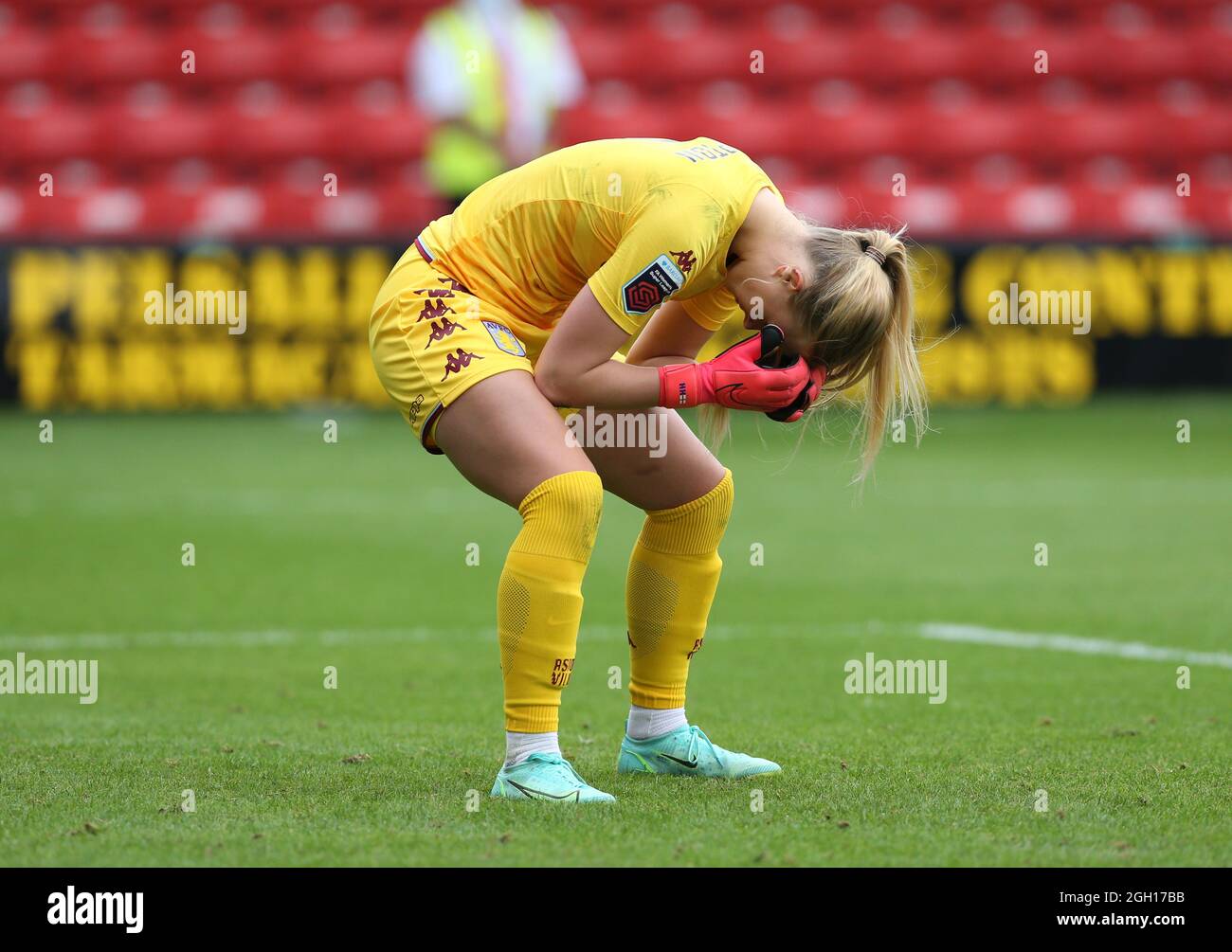 Aston Villa goalkeeper Hannah Hampton shows her dejection after spilling the ball into her own ...