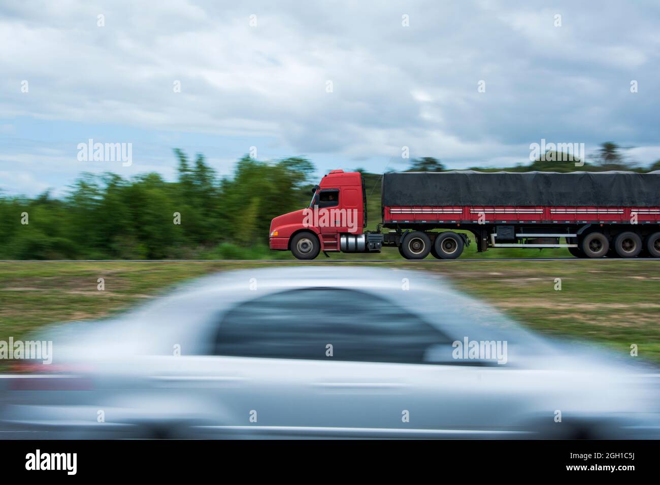 Salvador, Bahia, Brazil - October 08, 2015: Truck and car moving on the ...