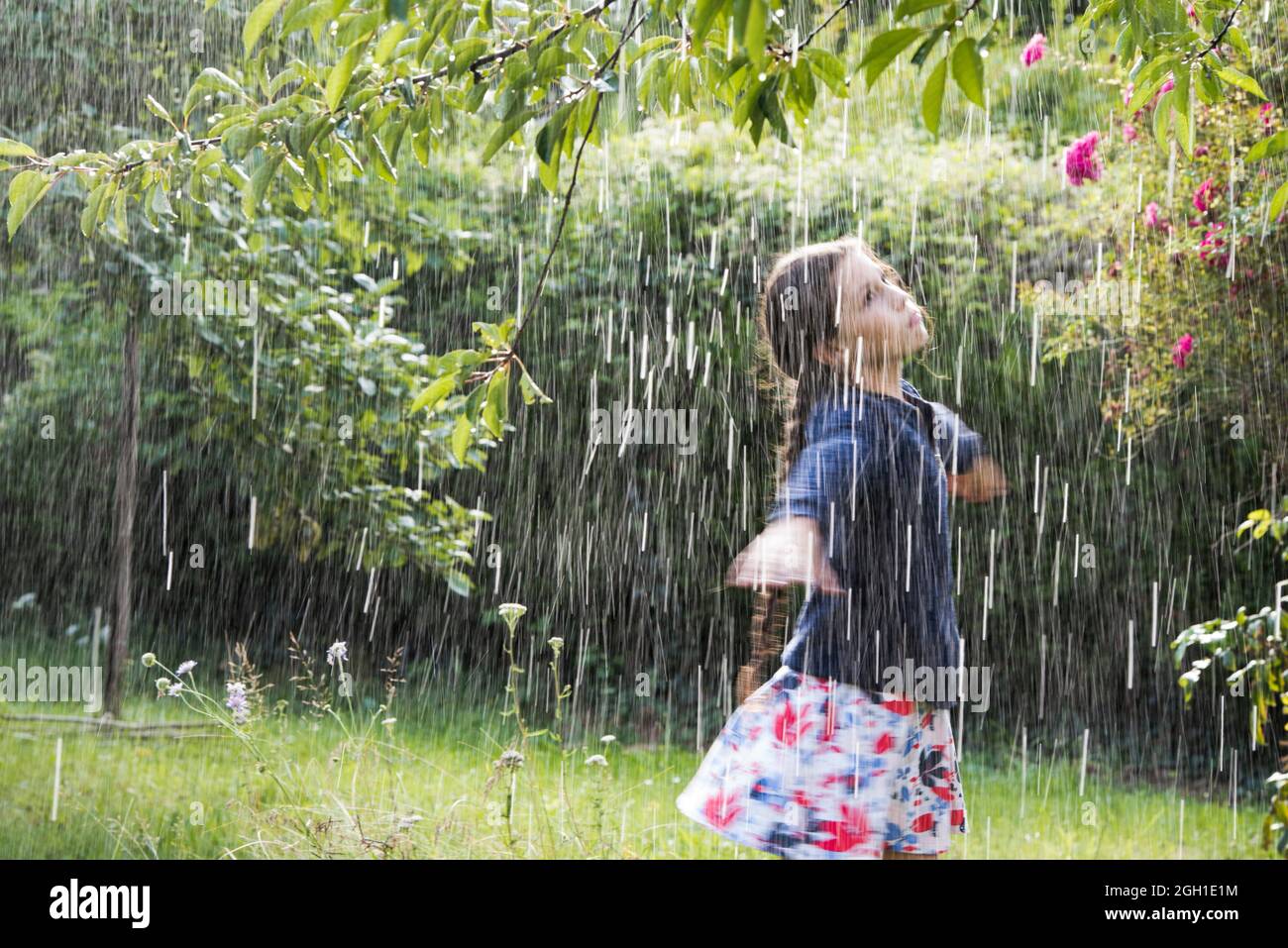 Happy Girl In Rain Wallpaper