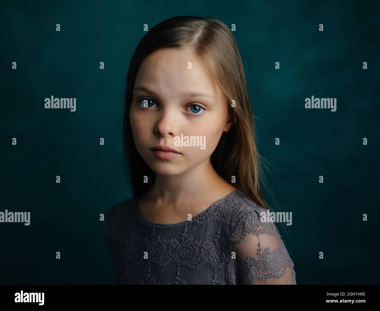 cute girl sad facial expression close up studio Stock Photo - Alamy