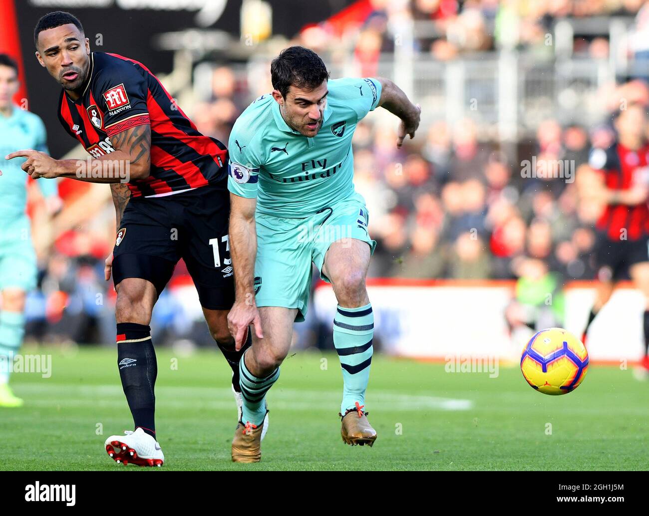 Sokratis Papastathopoulos of Arsenal holds off Callum Wilson of AFC ...
