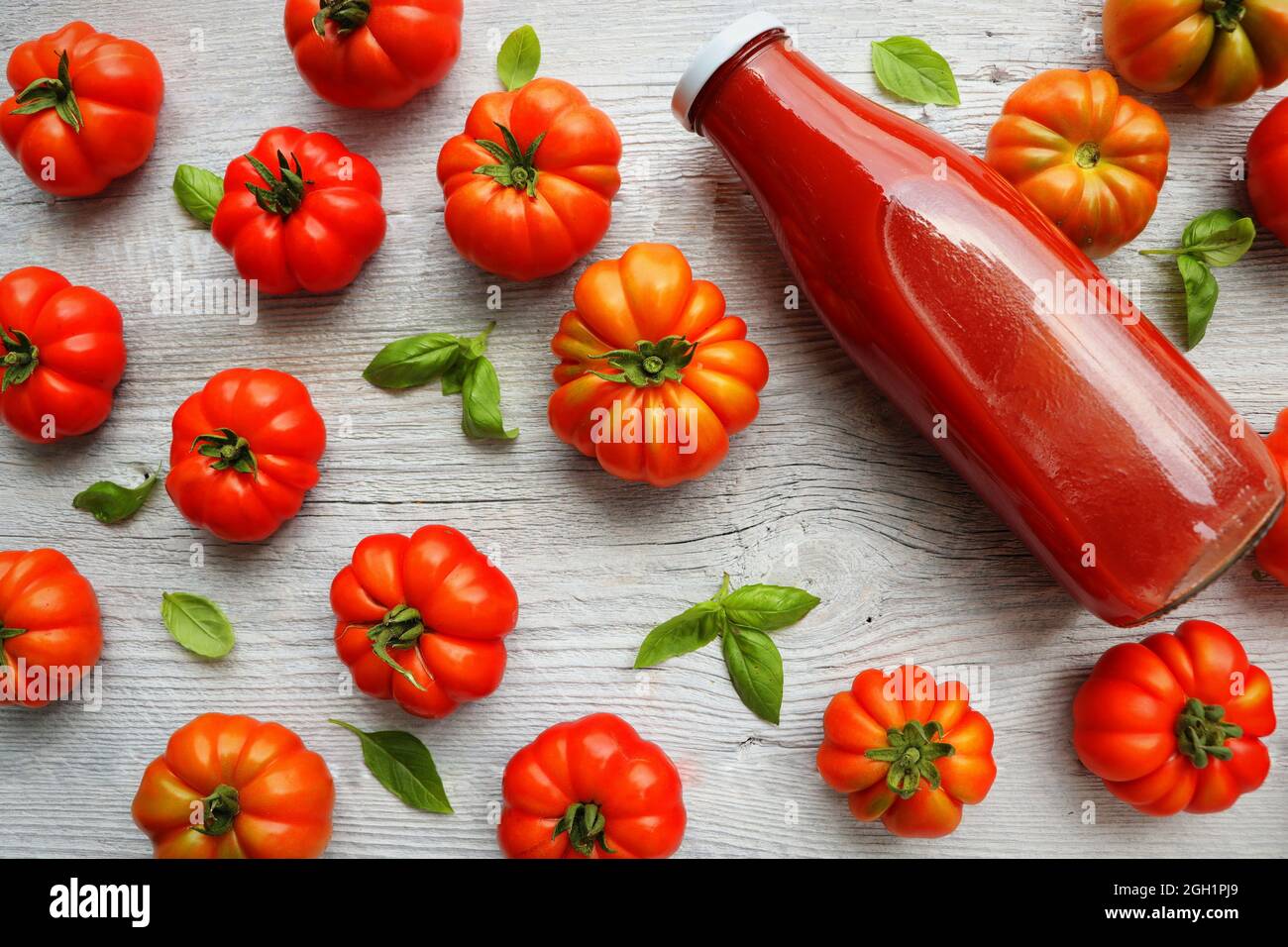 Flat lay composition with bottle of freshness juices on white wooden ...