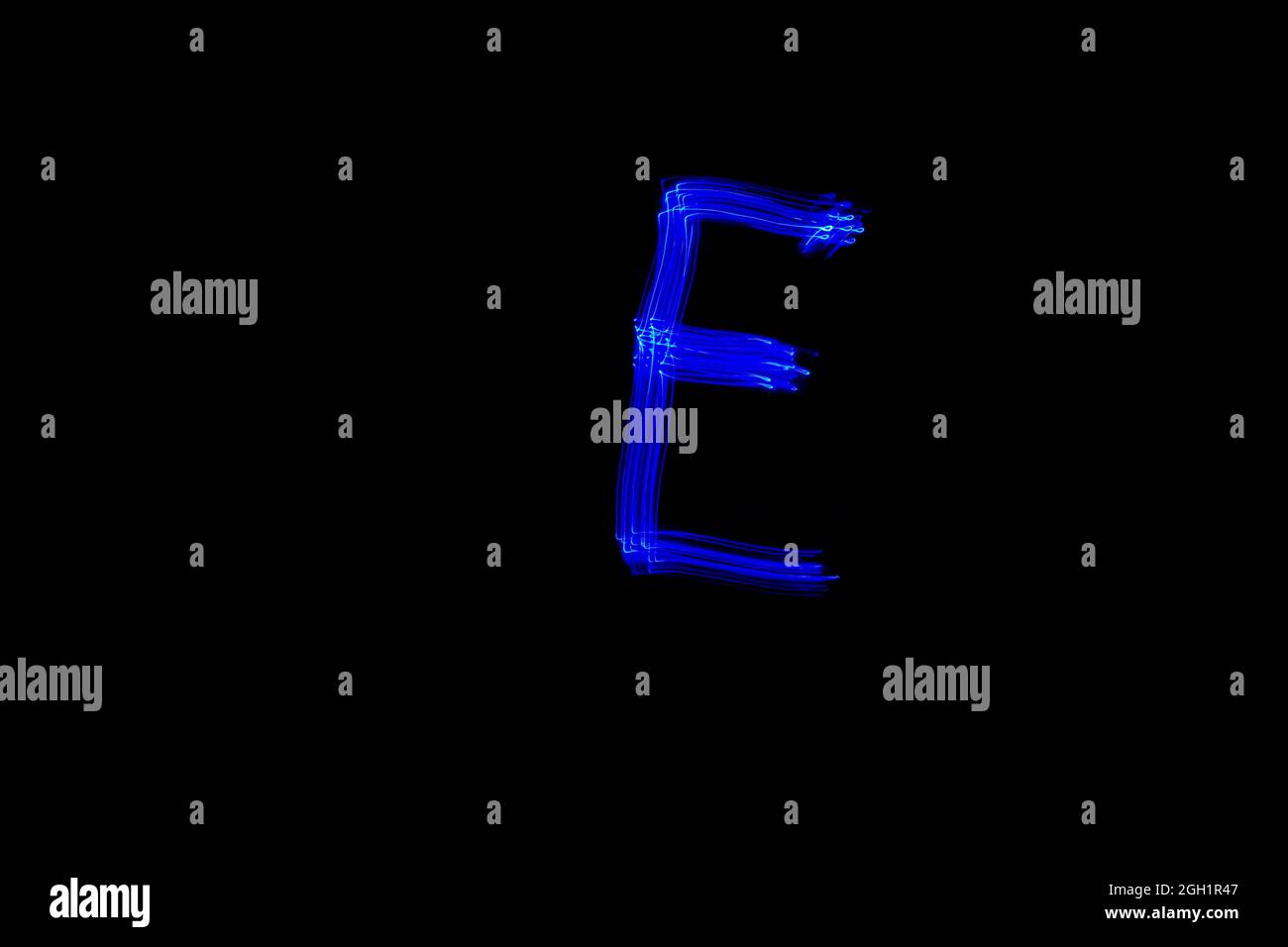 Letter E. Light painting alphabet. Long exposure photography. Drawn ...