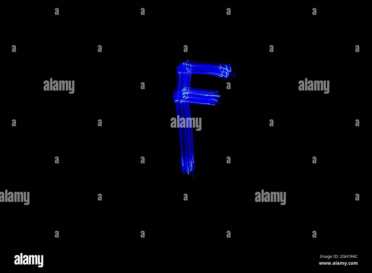 Letter F. Light painting alphabet. Long exposure photography. Drawn ...
