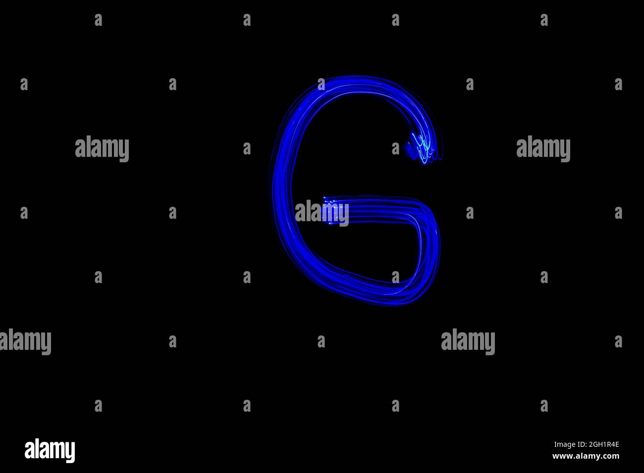Letter G. Light painting alphabet. Long exposure photography. Drawn ...