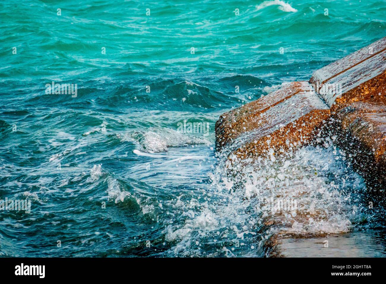 Closeup shot of sea waves in The Doha Corniche waterfront in Doha ...