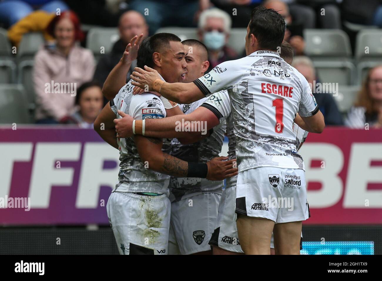 Ken Sio (2) of Salford Red Devils celebrates his try in, on 9/4/2021 ...