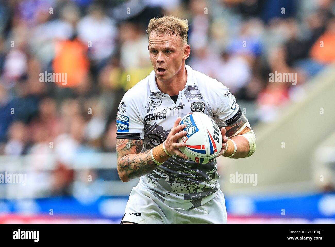 Kevin Brown (7) of Salford Red Devils in action Stock Photo - Alamy