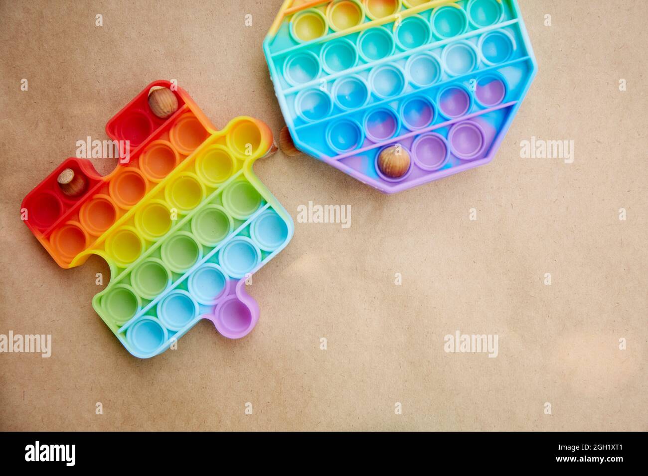 Pop it toy with hazel nuts. Invented games for motor skills development ...