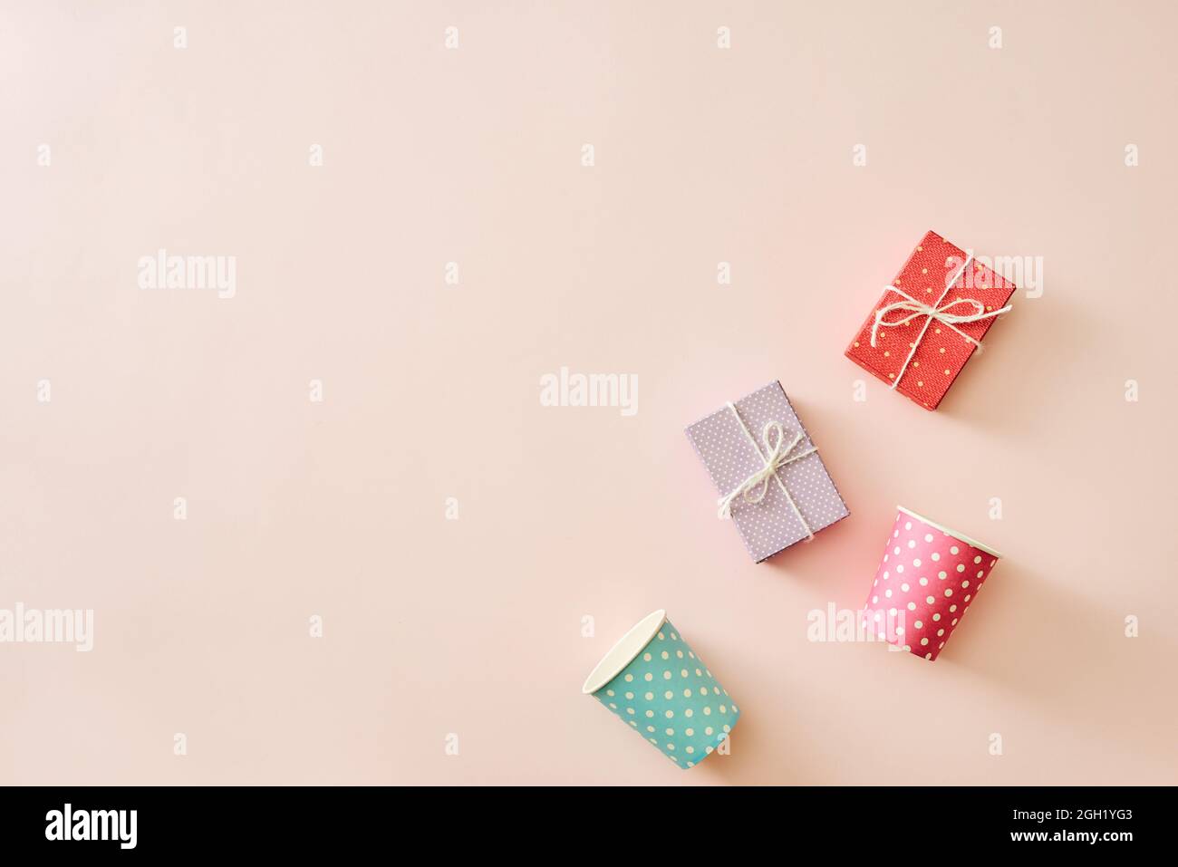 Funny birthday party background on beige Stock Photo - Alamy
